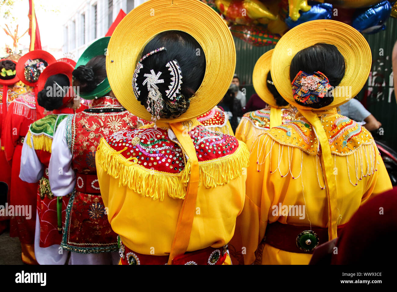 Vietnamese women participating in the traditional Dong Ky FIrecracker ...