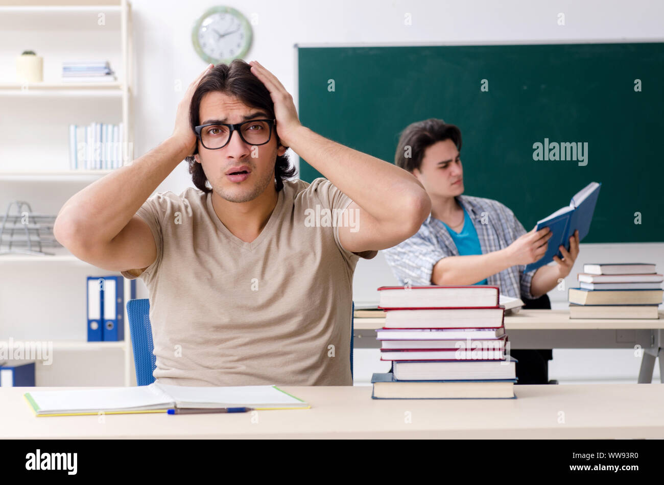 The two male students in the classroom Stock Photo - Alamy