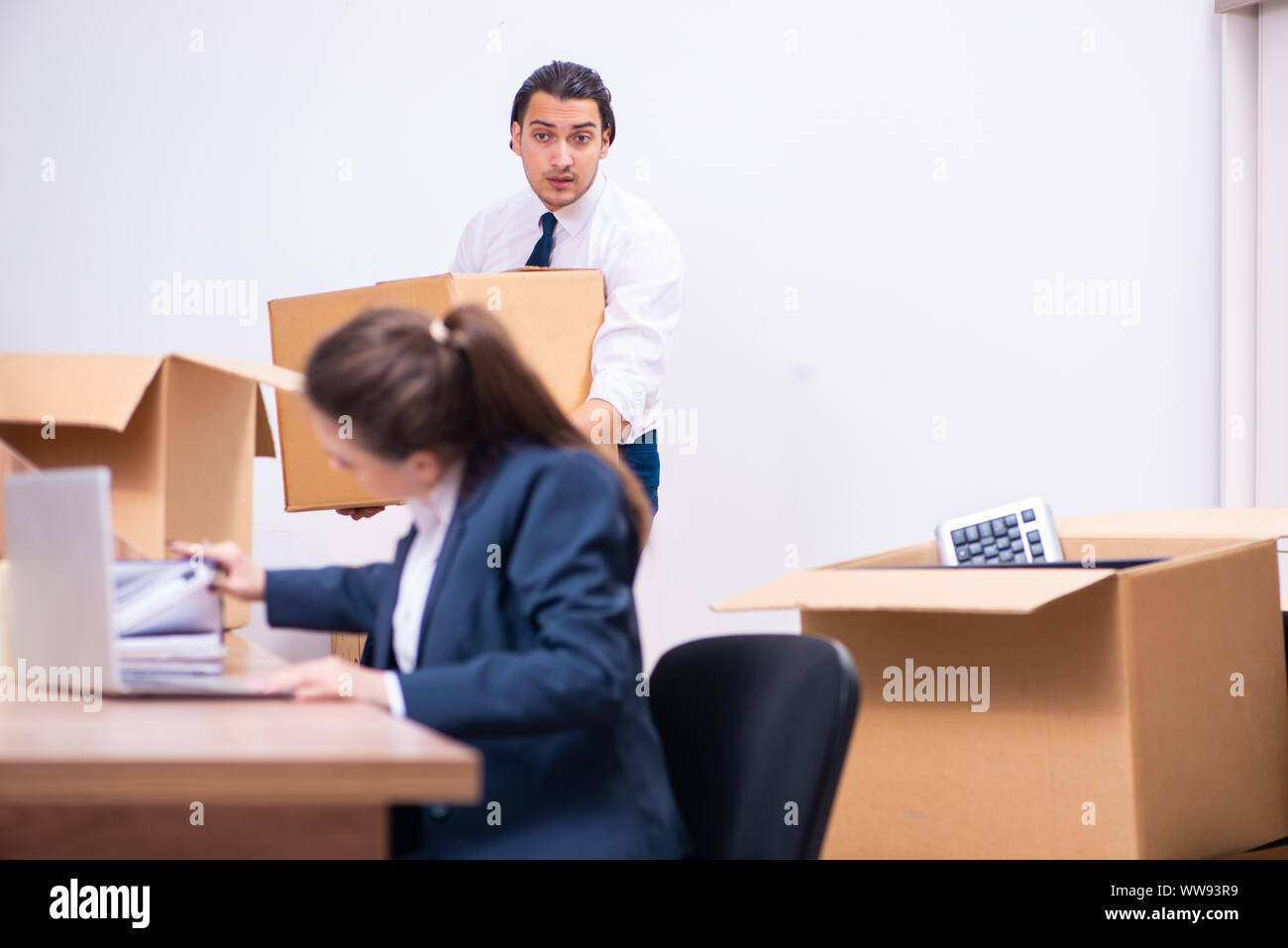 The two employees being fired from their work Stock Photo - Alamy