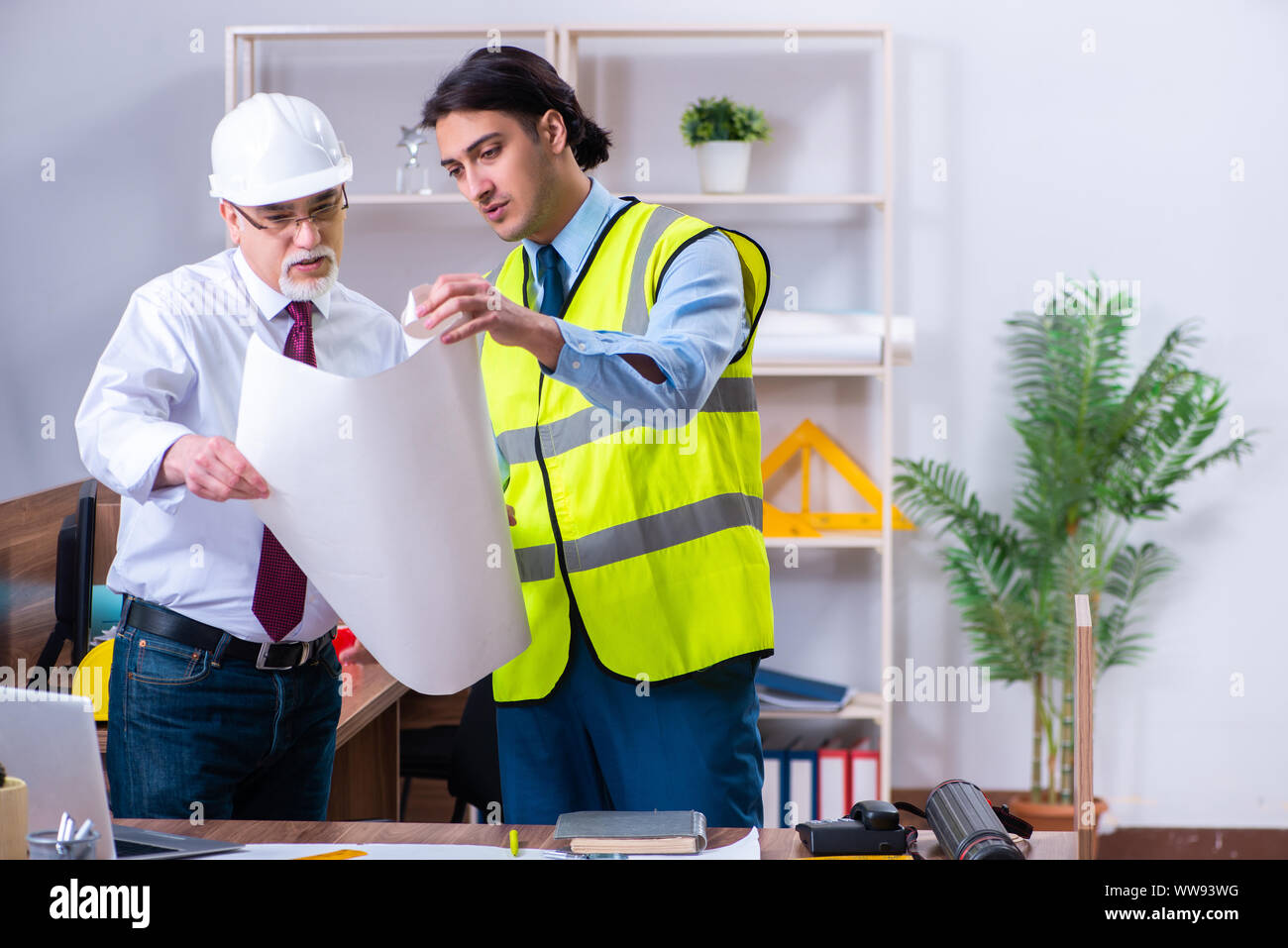 The two architects working on the project Stock Photo - Alamy