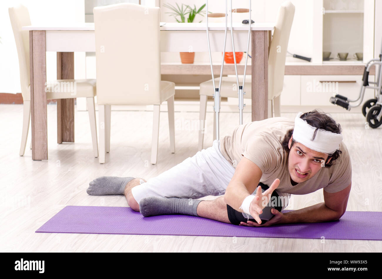 Injured young man doing hi-res stock photography and images - Alamy