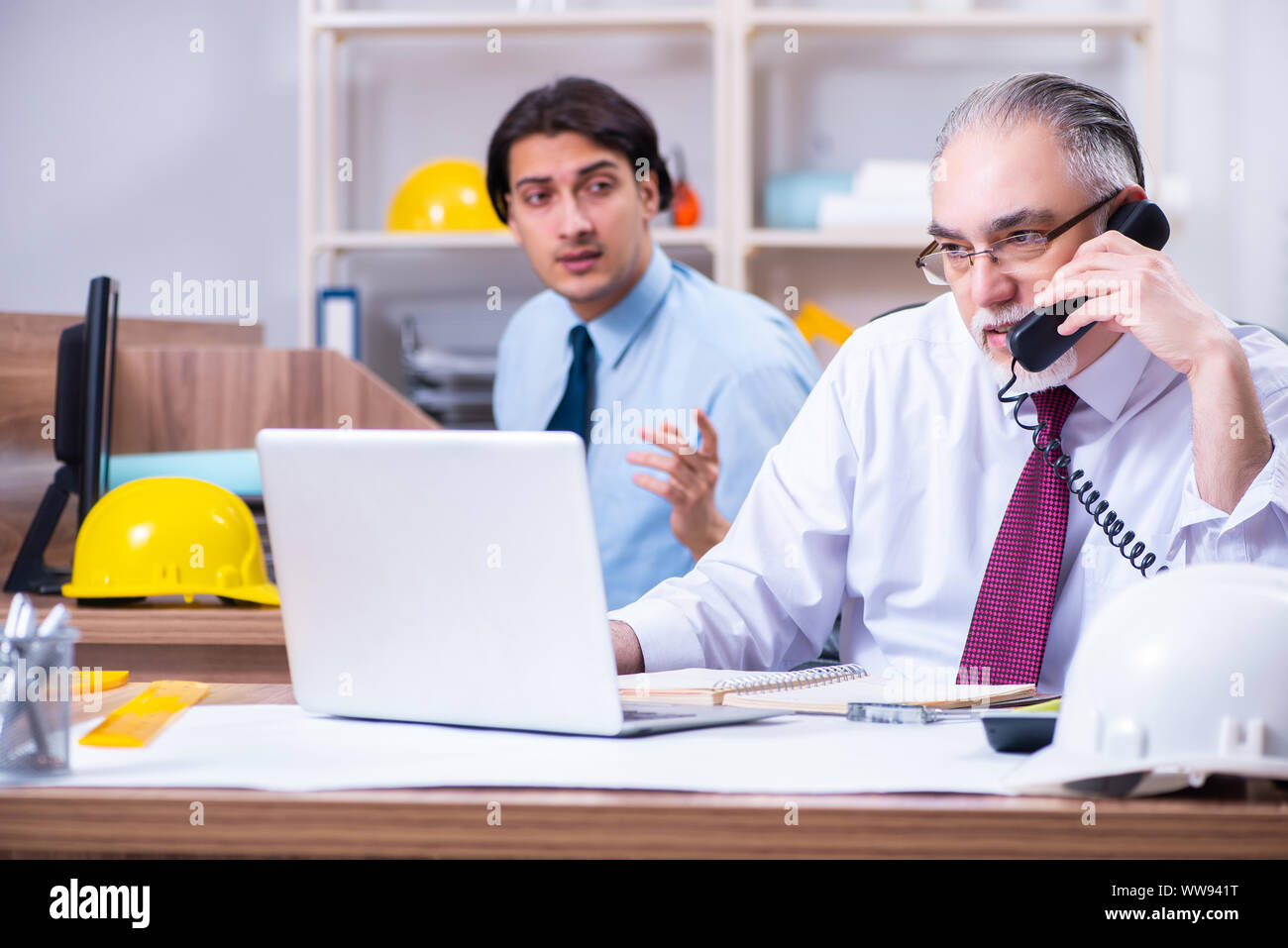 The two architects working on the project Stock Photo - Alamy