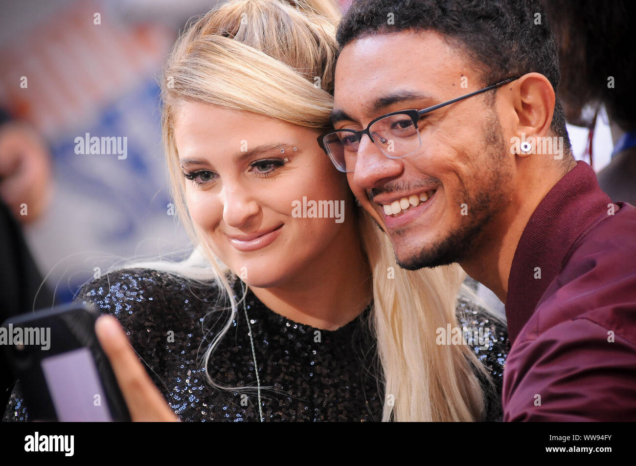 New York, United States. 13th Sep, 2019. Meghan Trainor takes photos ...
