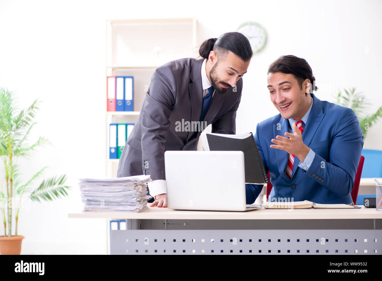 The two male colleagues in the office Stock Photo - Alamy