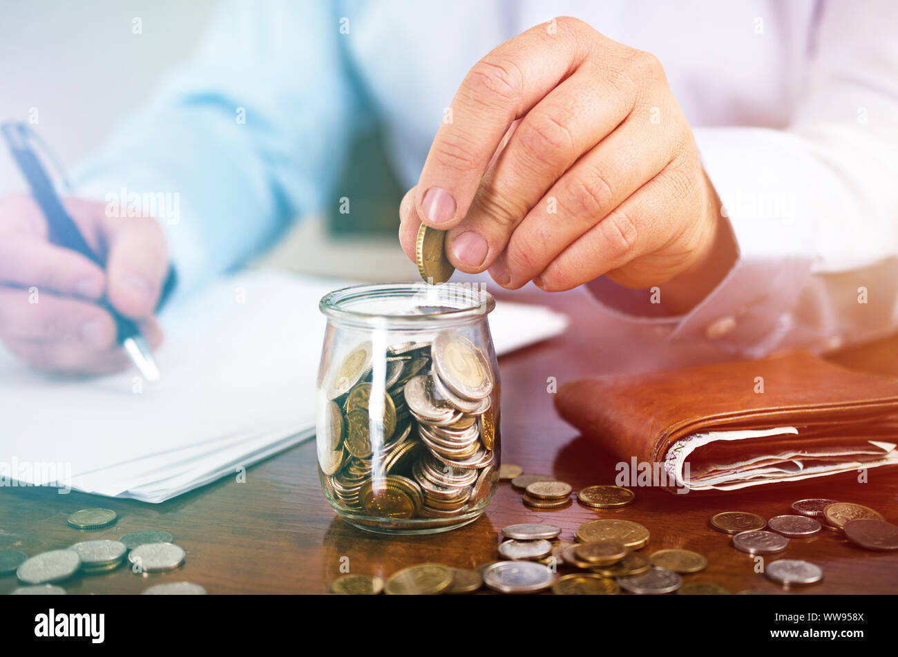 Man doing finances and calculate home budget, saving money, finance ...