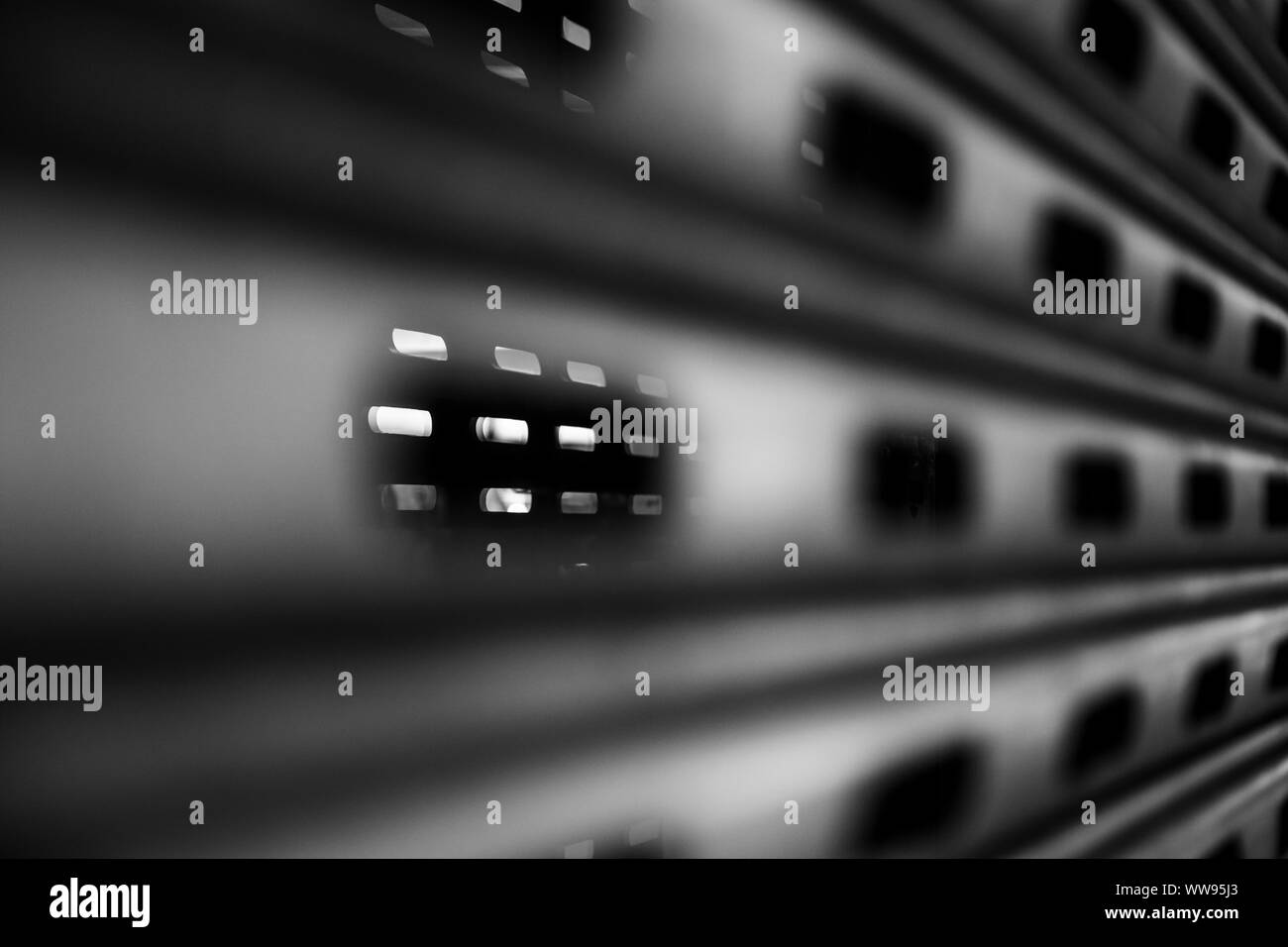 Close up black and white view of building abstract highlighting texture ...