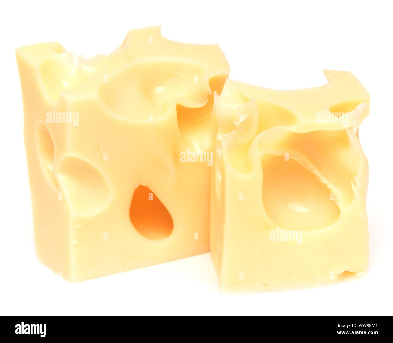 Two cubes of cheese isolated on white background Stock Photo - Alamy