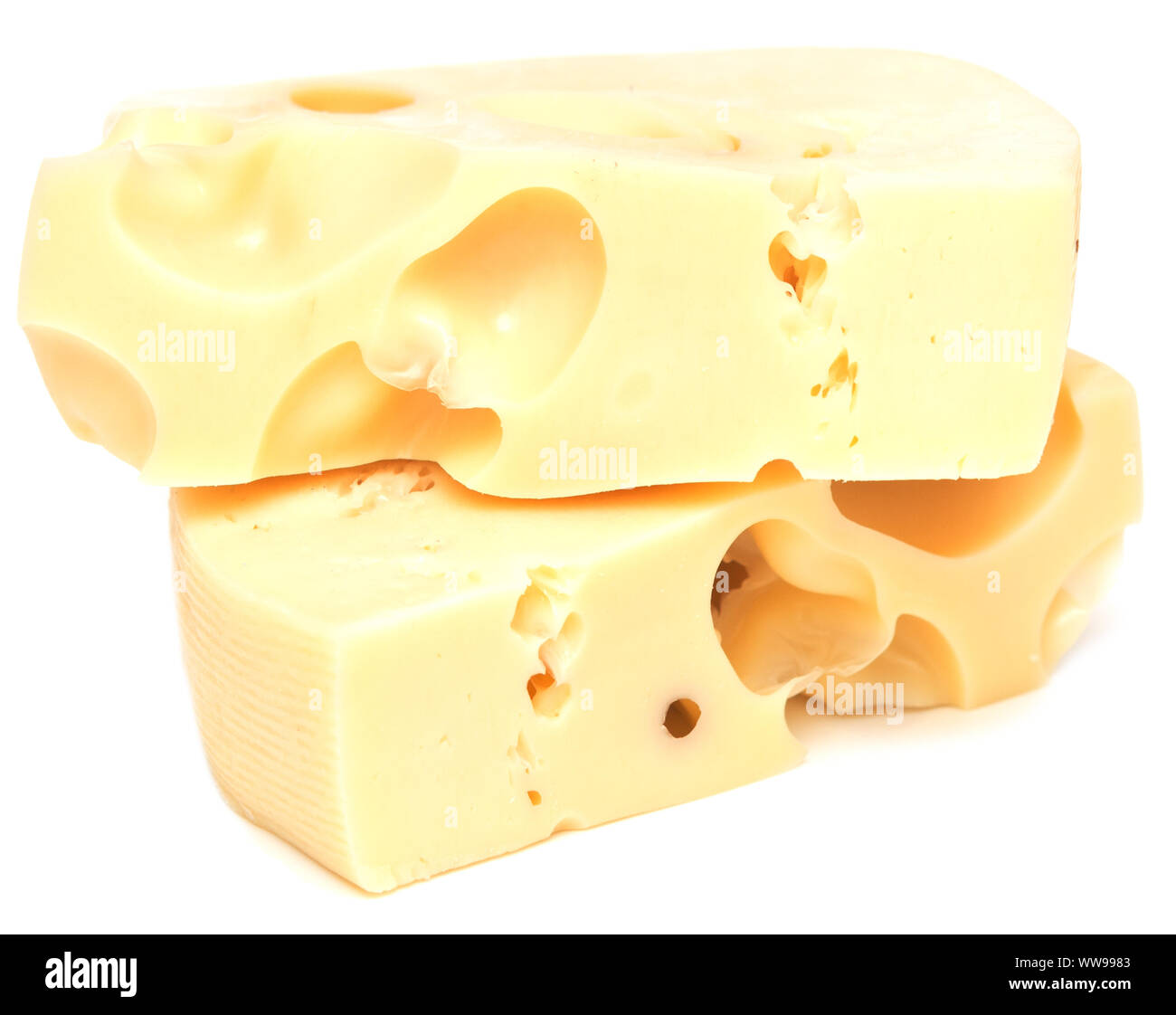 Two cubes of cheese isolated on white background Stock Photo - Alamy