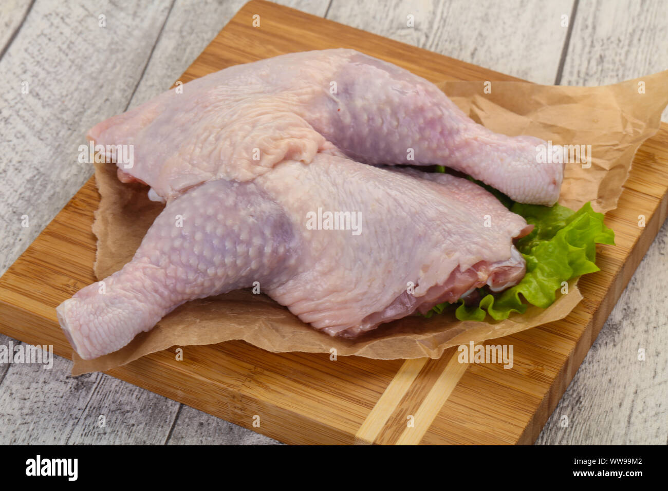 Raw chicken leg ready for cooking Stock Photo - Alamy