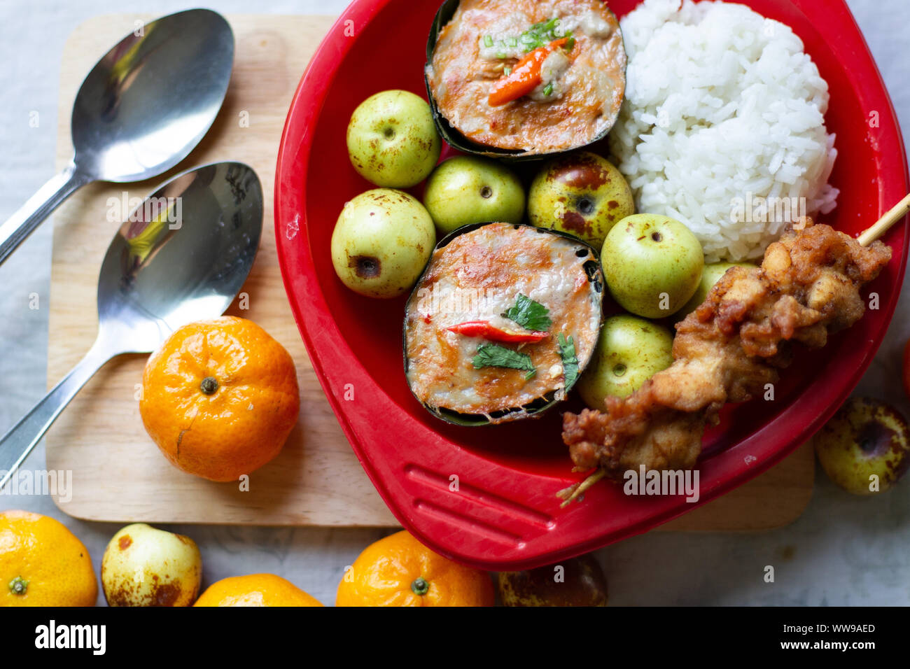 Traditional Thai food called haw moak which is a steamed curried fish ...