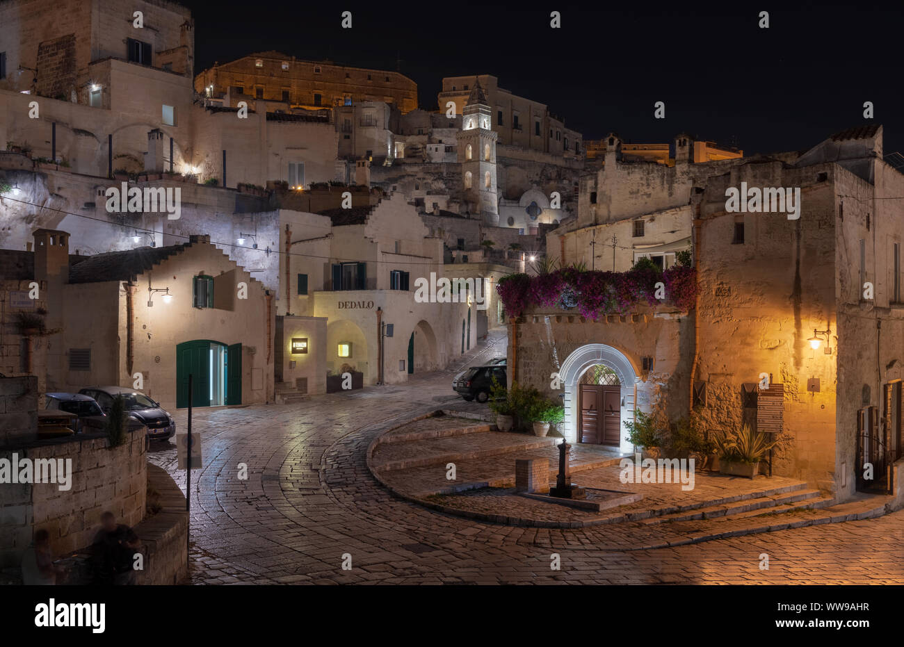 Night walk at heart of Sassi the stone city of Matera in Italy ...