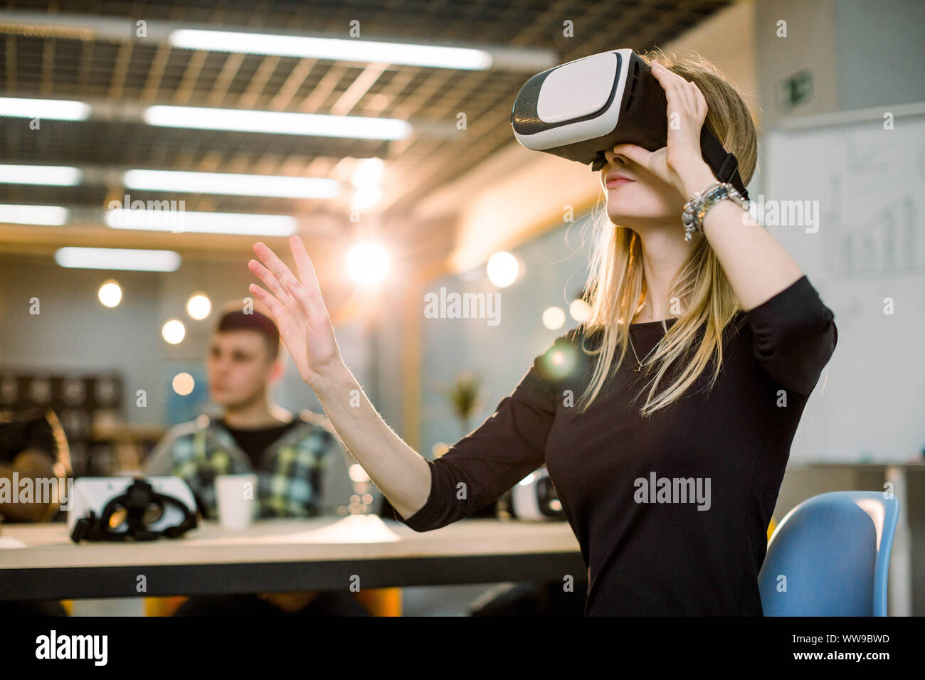 Creative business team using virtual reality glasses at the office ...