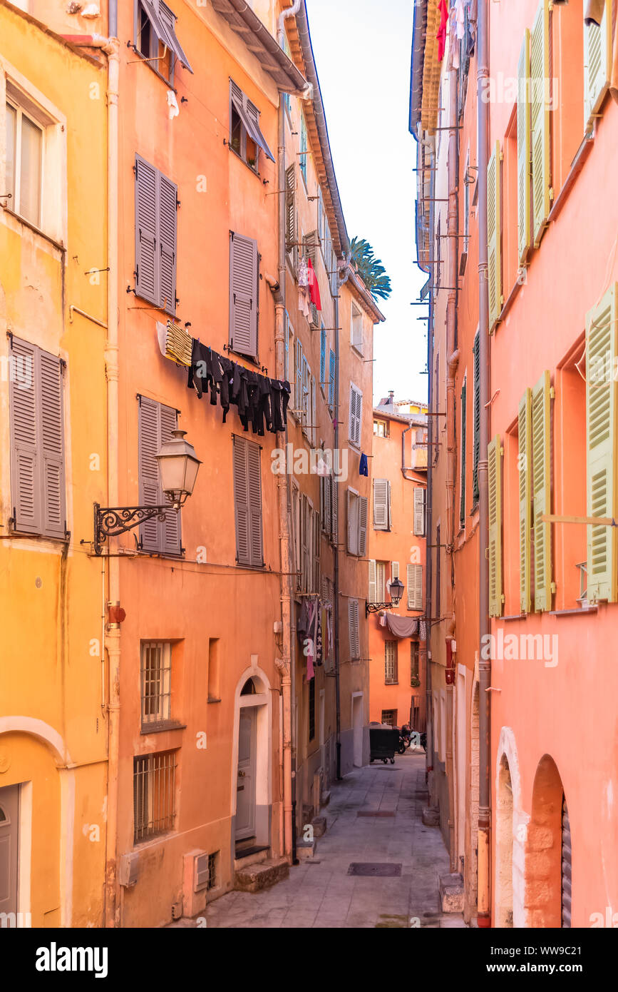 Nice, France, colorful facade, with typical windows and shutters, in a ...