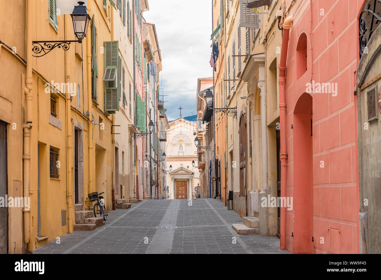 Nice, France, colorful facade, with typical windows and shutters, in a ...