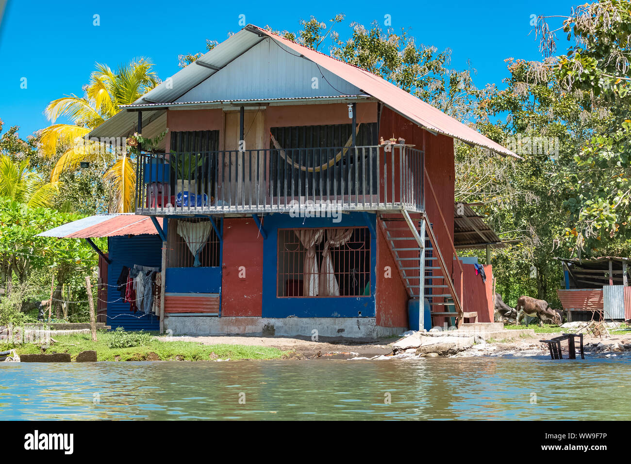 Costa Rica, typical house on the river, in Tortuguero, wildlife in the ...