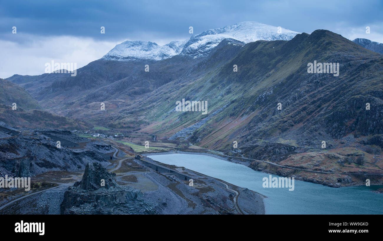 Stunning landscape image of Dinorwig Slate Mine and snowcapped Snowdon ...