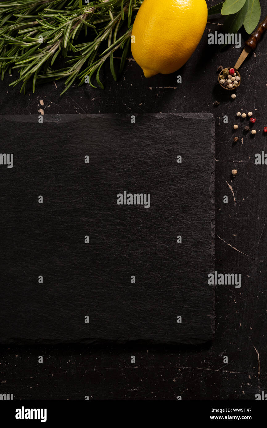 Slate food background with spice Stock Photo - Alamy