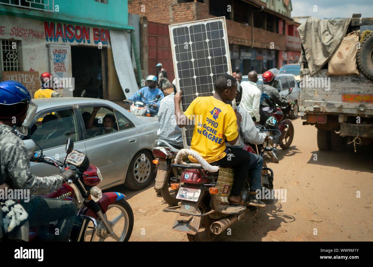 Bukavu, Congo. 04th Sep, 2019. A motorcyclist transports a solar panel ...