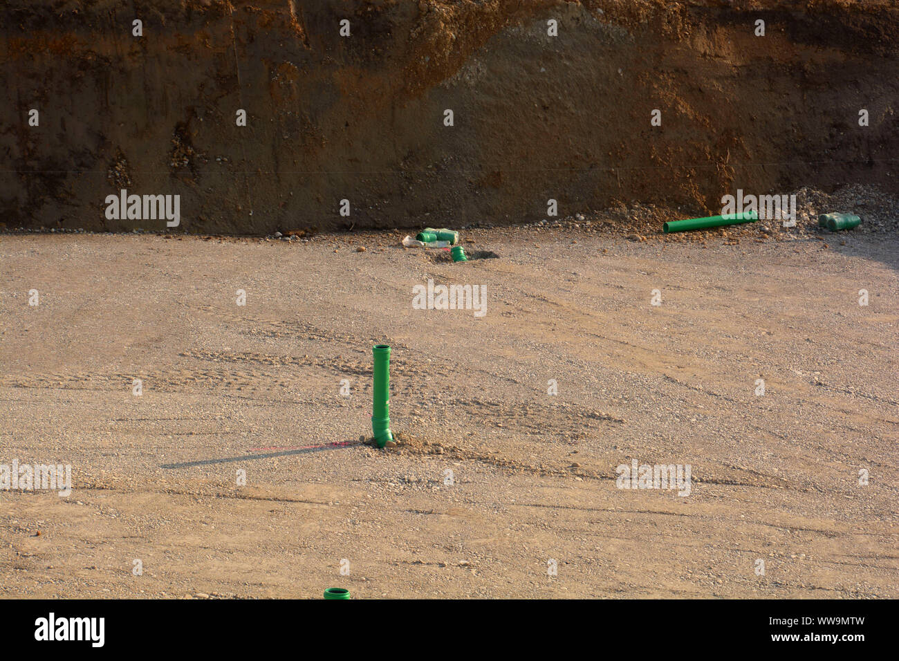 green Plastic pipes on the construction site for a water connection ...