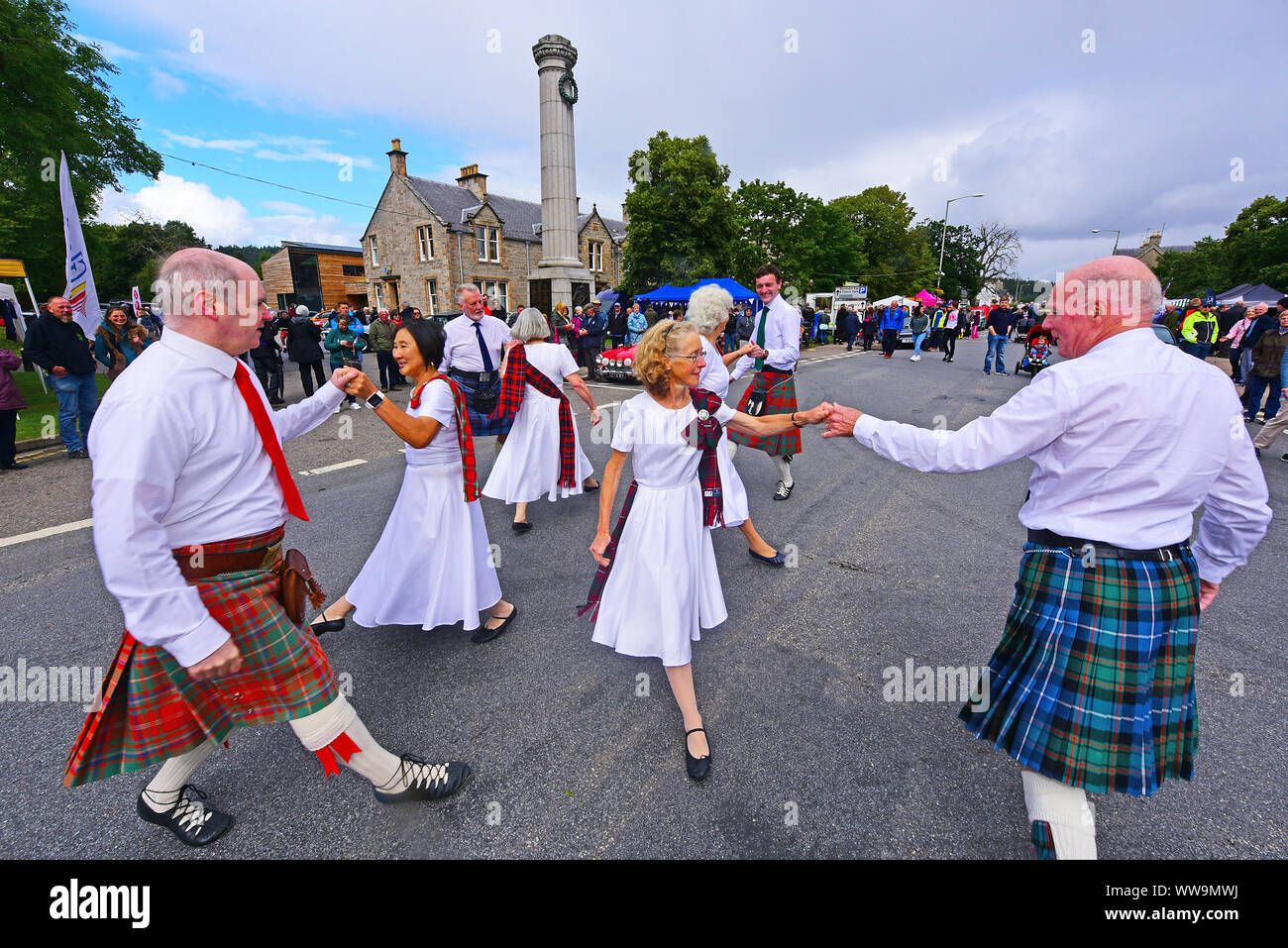 Scottish traditional country Dancers performing in the town square in ...