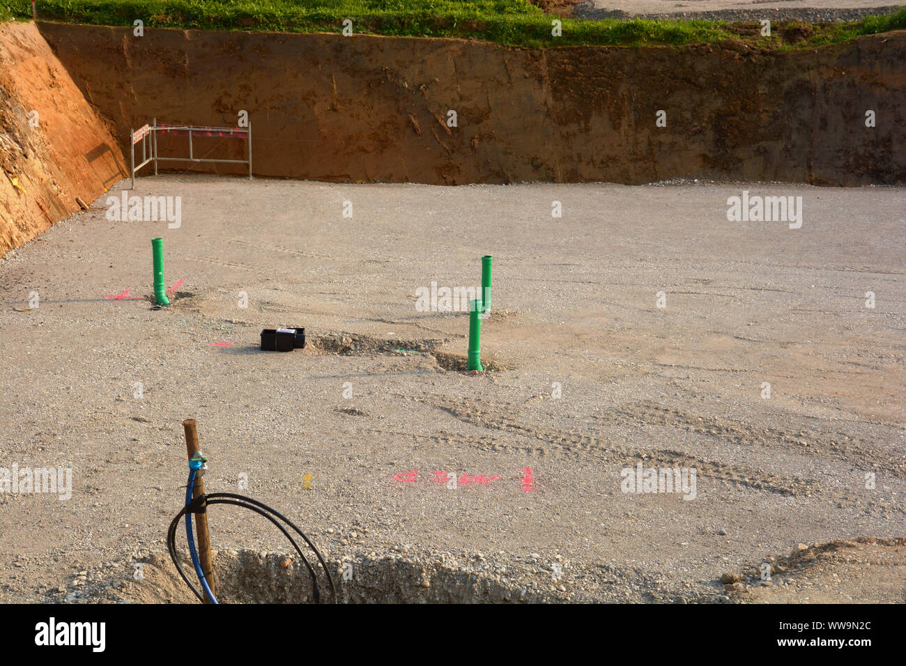 sewer pipes that are installed in the excavation pit, green Plastic ...