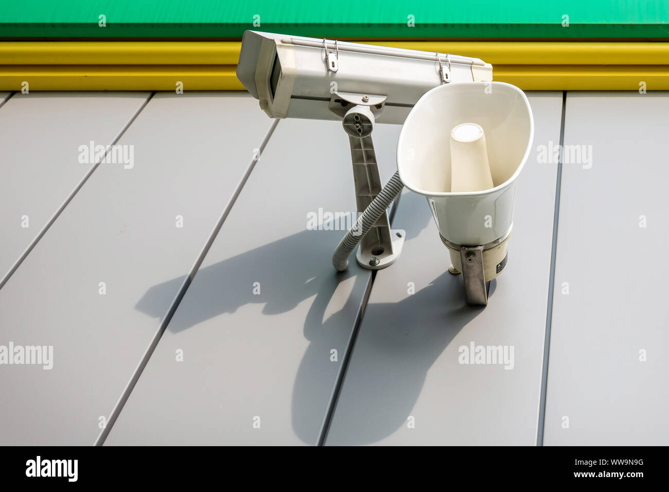 outdoor surveillance and tracking security camera with a megaphone on ...