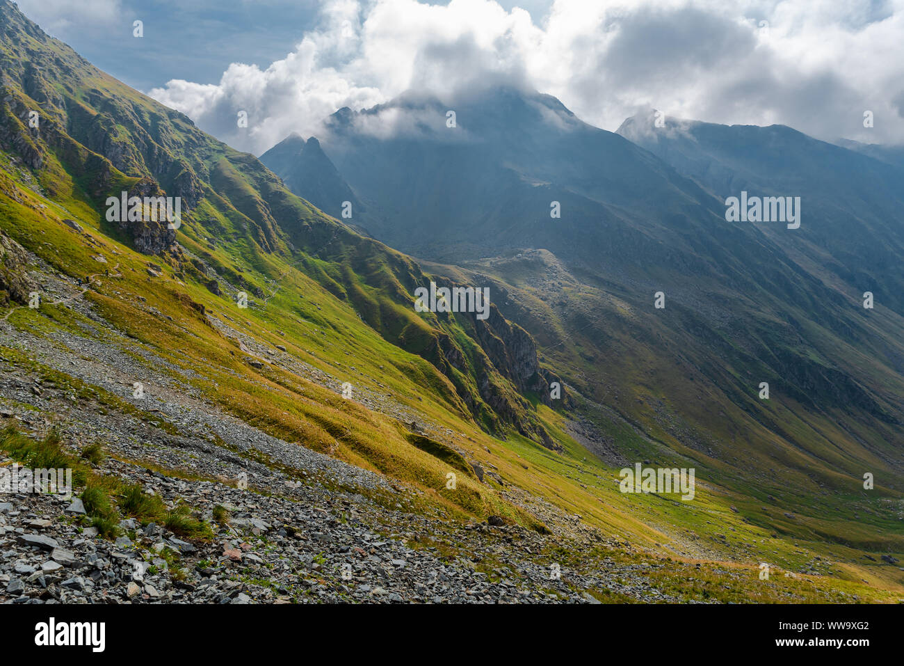 Wild mountain landscape with clouds. Fagaras Mountains, Romania Stock ...