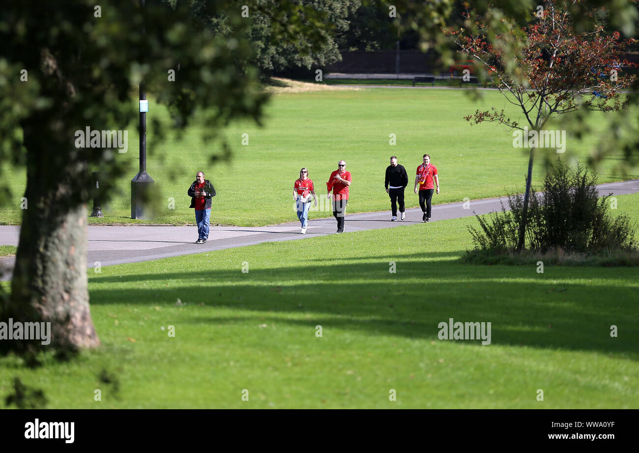 Liverpool fans arrive to the ground ahead of the Premier League match ...