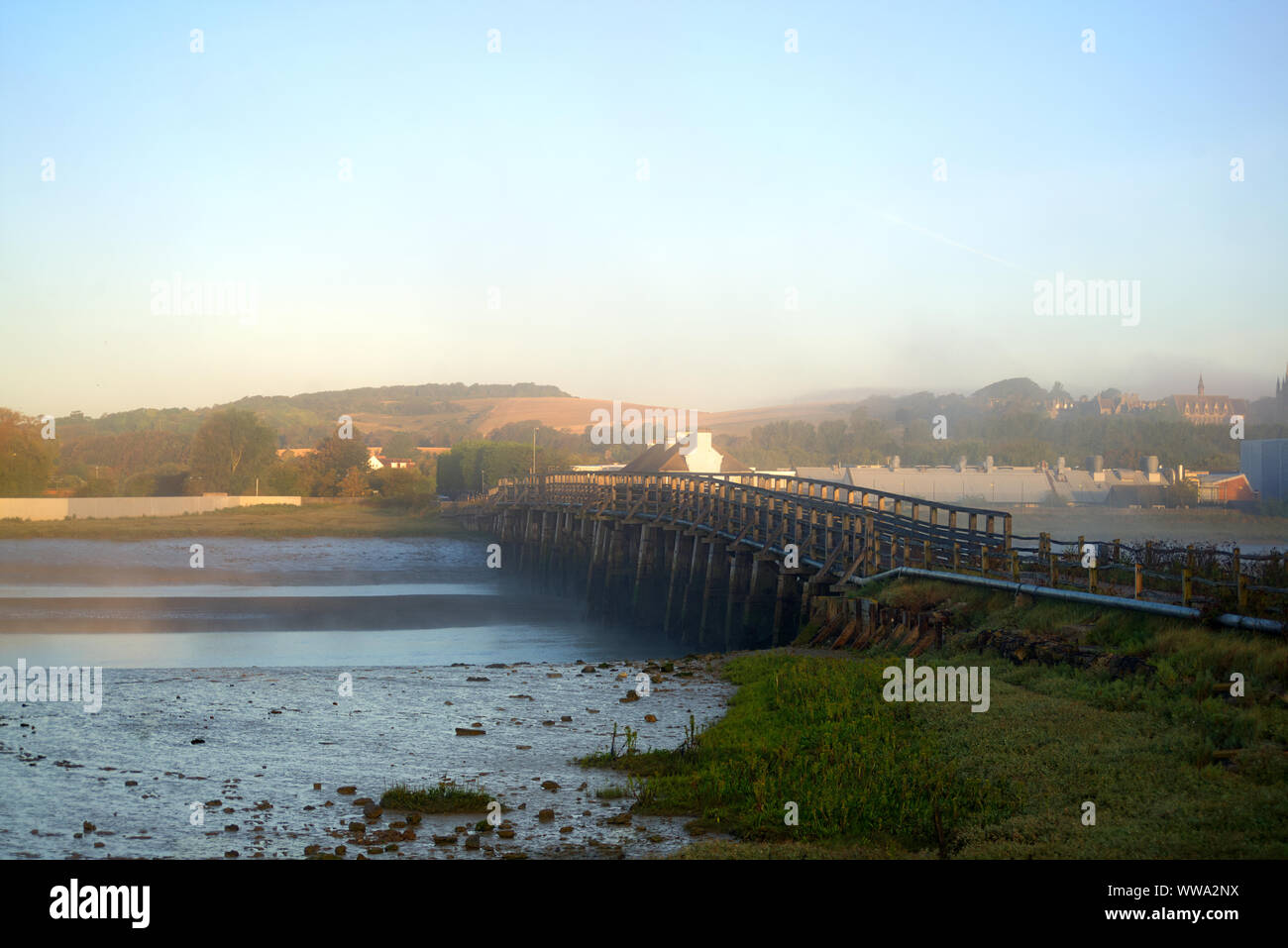 bridges spanning rivers at low tide Stock Photo - Alamy