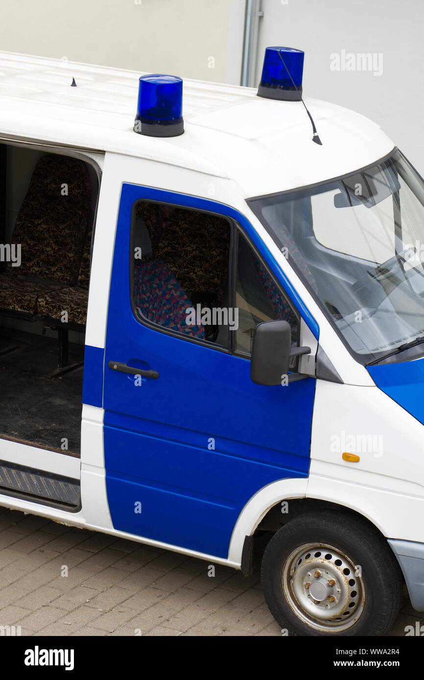 Police van with light bars on the street Stock Photo - Alamy