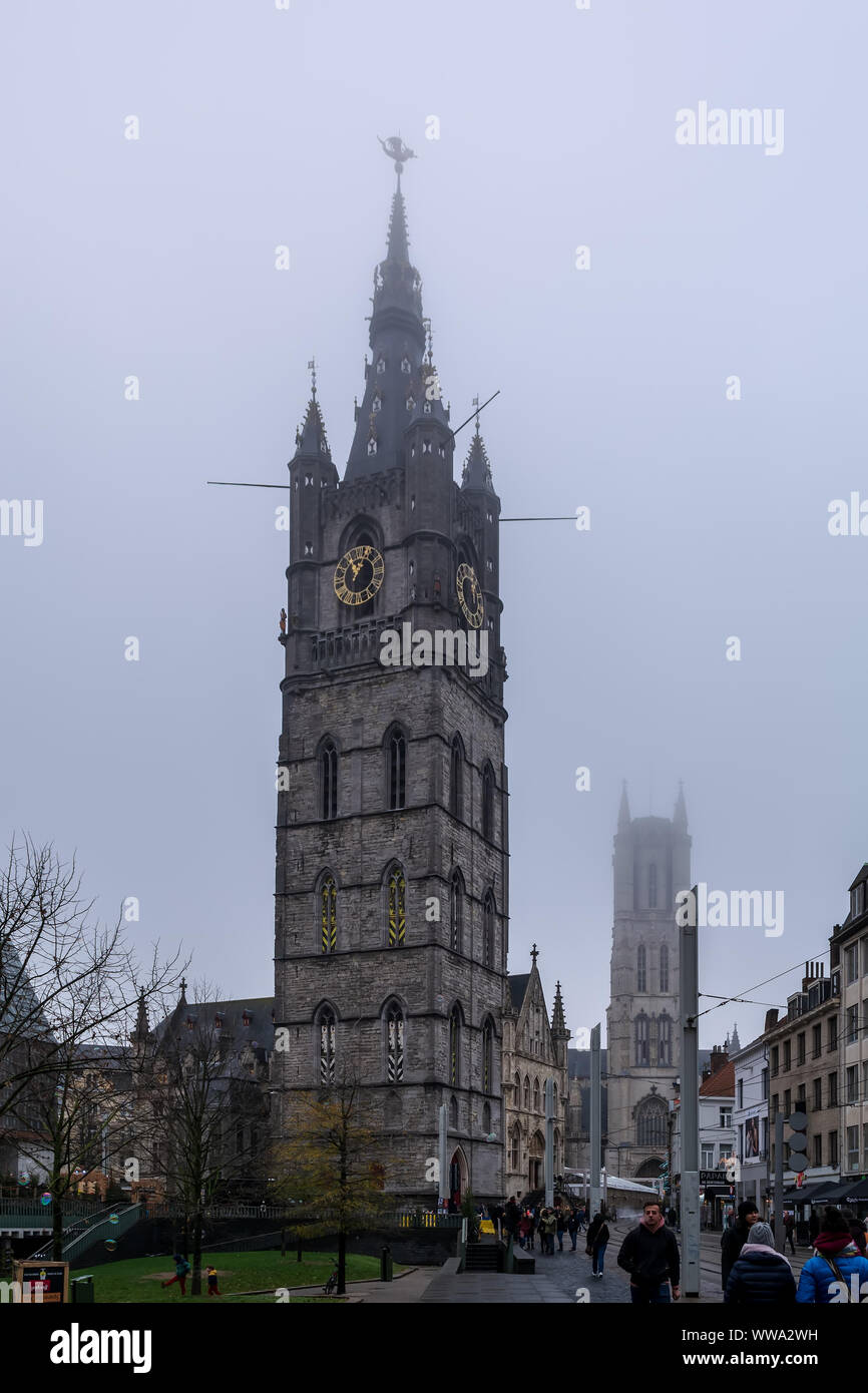 The massive outline of the 91m-high Belfry of Ghent, topped by a dragon ...