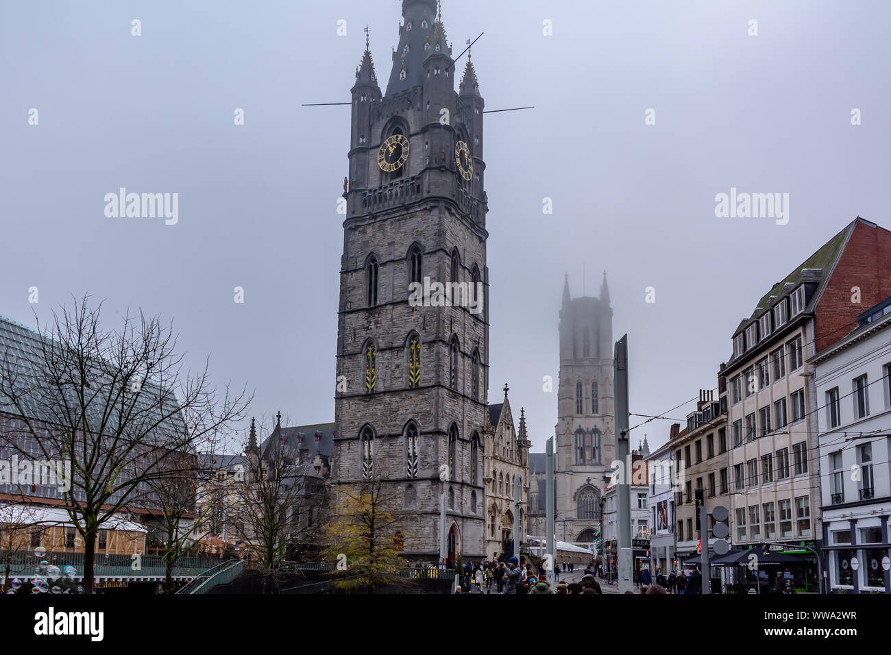 The massive outline of the 91m-high Belfry of Ghent, topped by a dragon ...