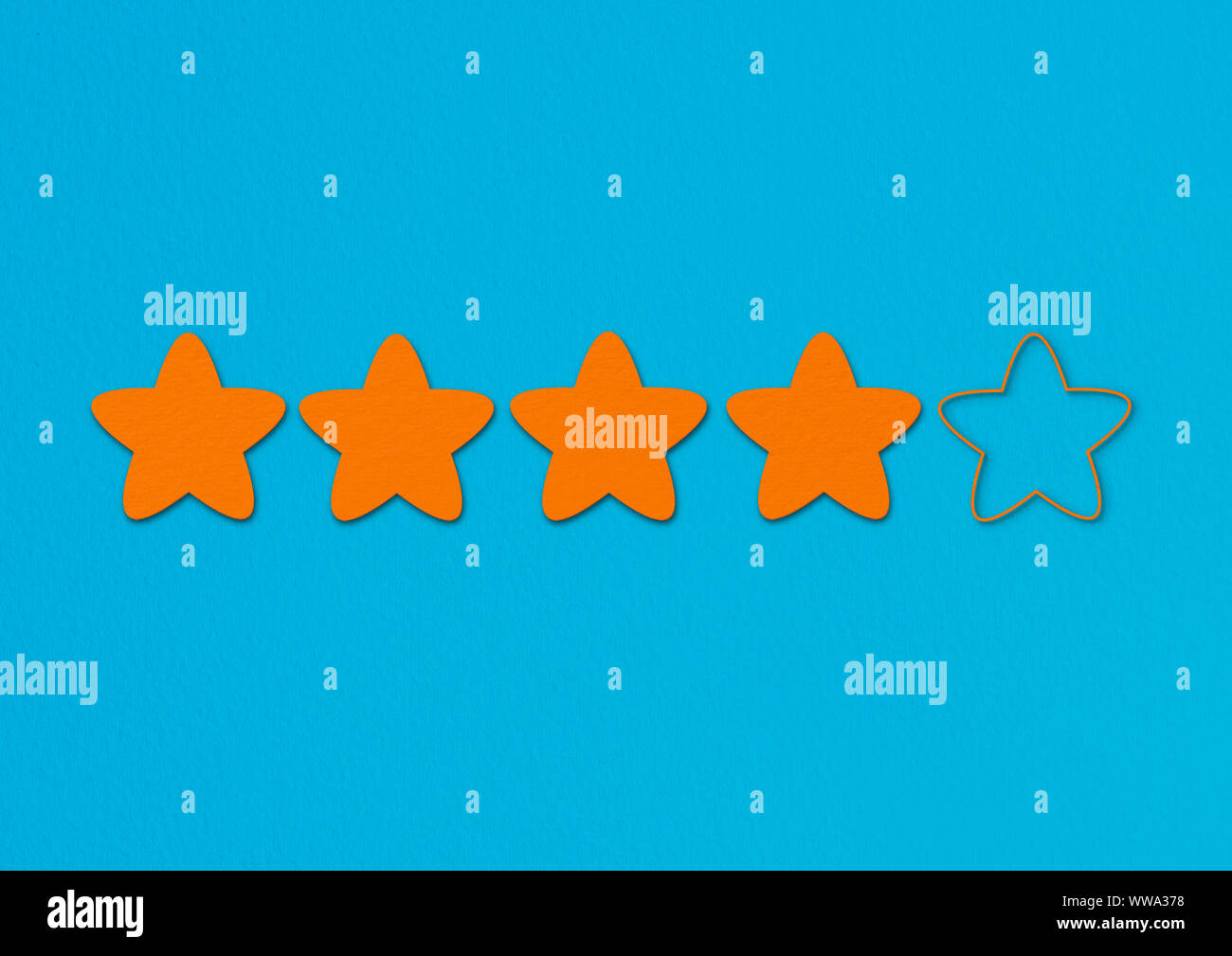 Orange stars rating on a blue background. A conceptual image of a level ...