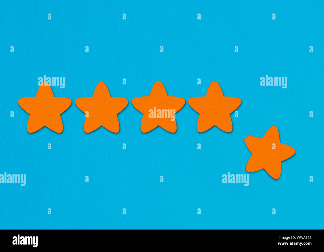 Orange stars rating on a blue background. A conceptual image of a level ...
