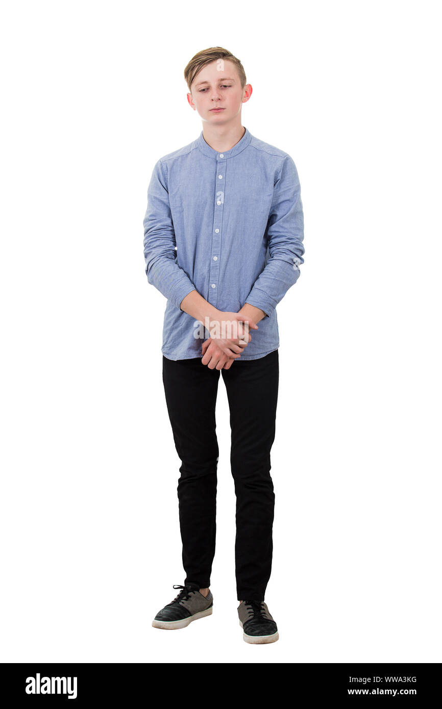Full length portrait of thoughtful teenager guy looking down as feel ...