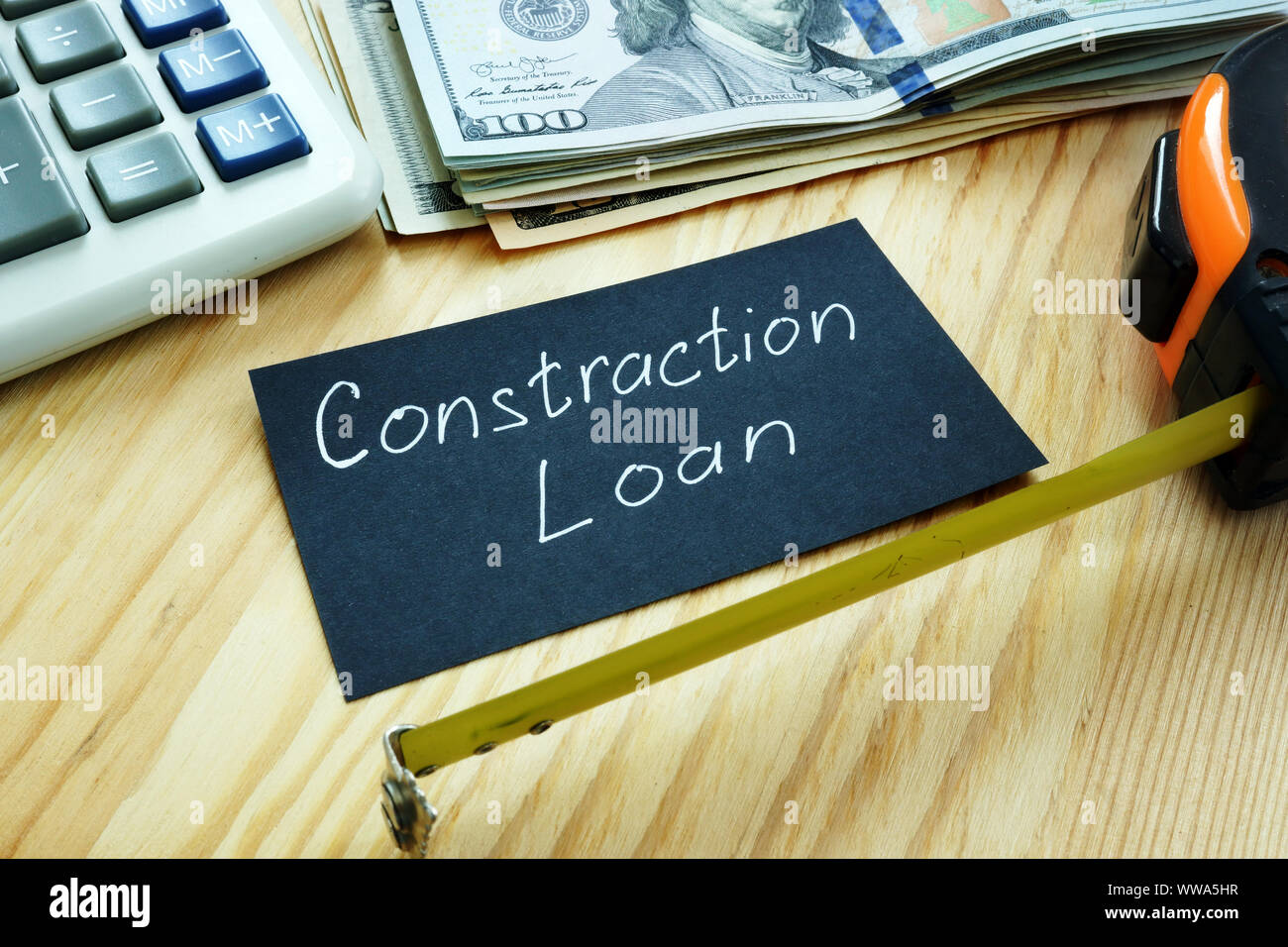 Money construction hi-res stock photography and images - Alamy
