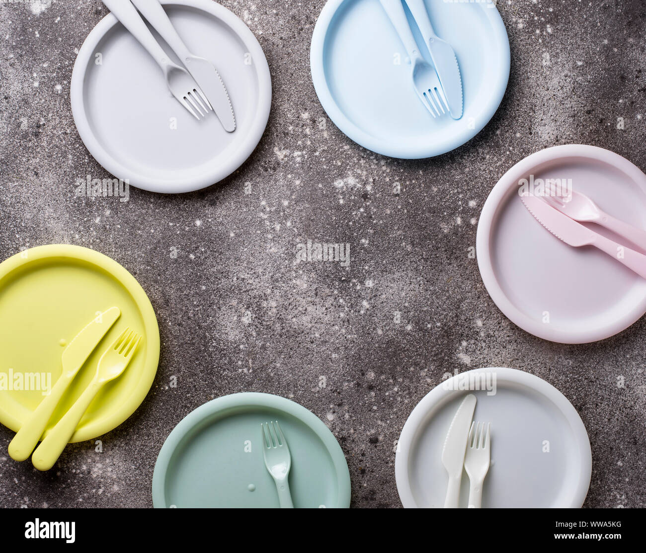 Colorful plastic dishes for summer picnic Stock Photo - Alamy
