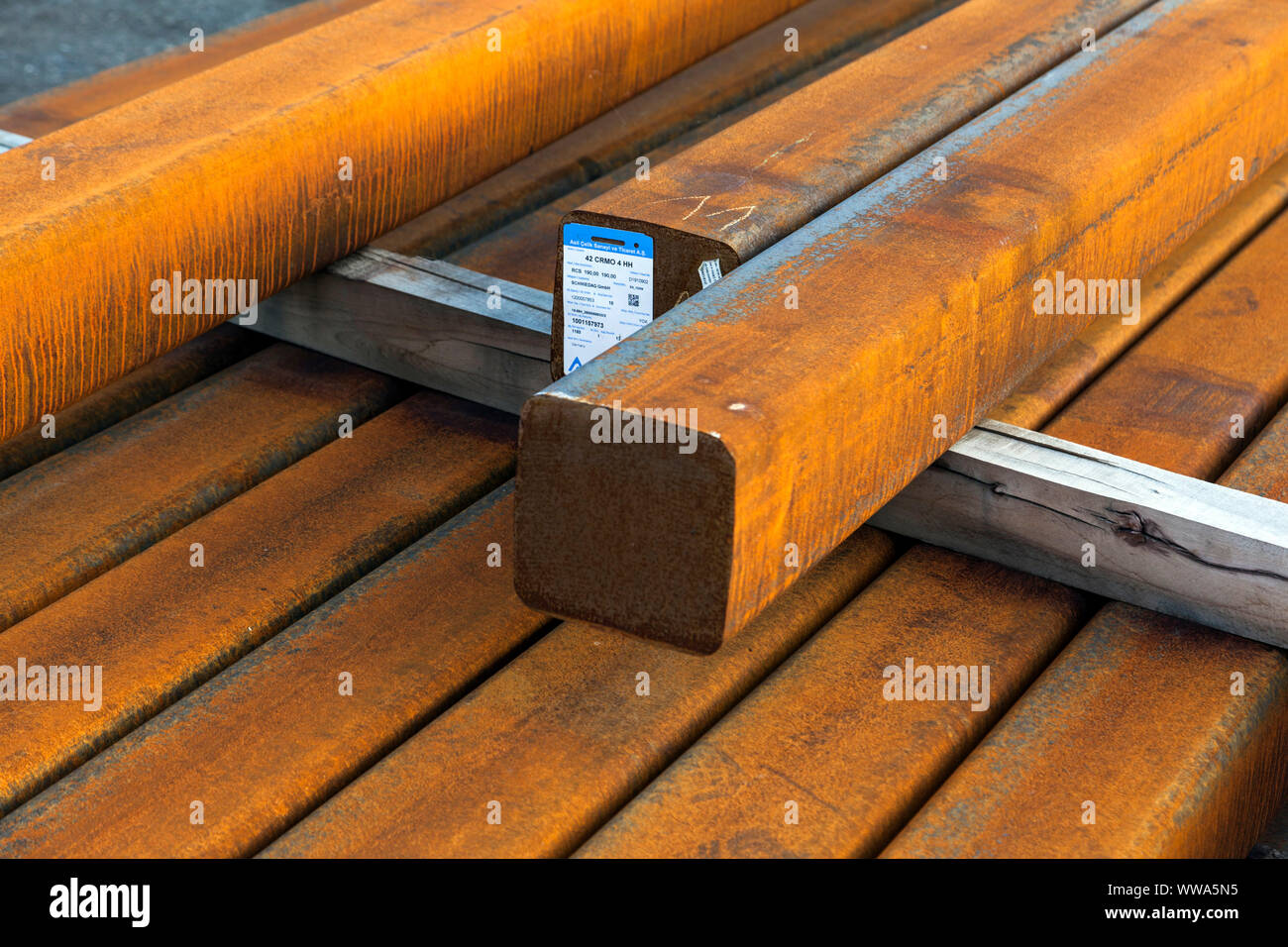 Square profile iron in a warehouse Stock Photo - Alamy