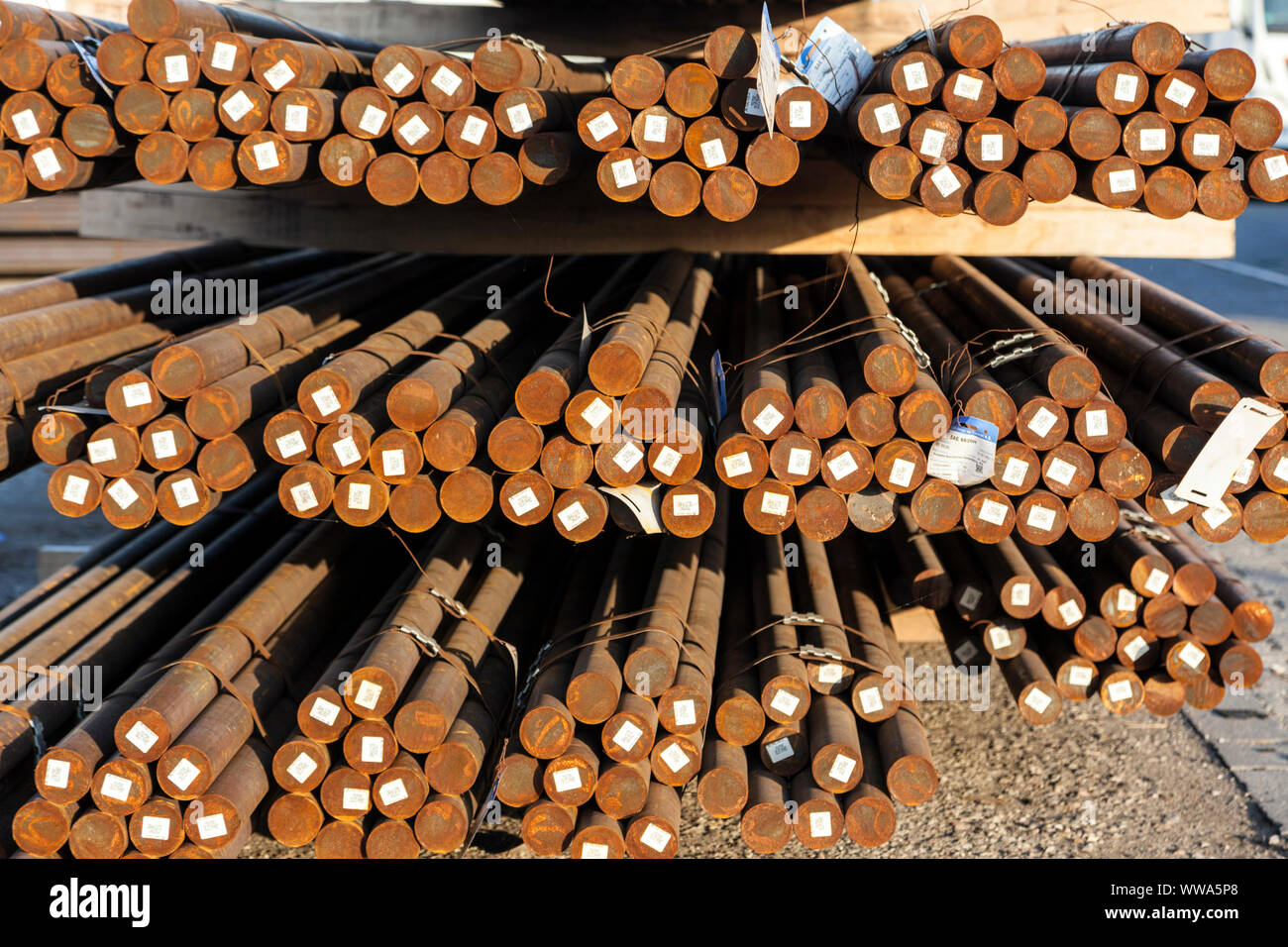 Round steel in a steel warehouse Stock Photo - Alamy