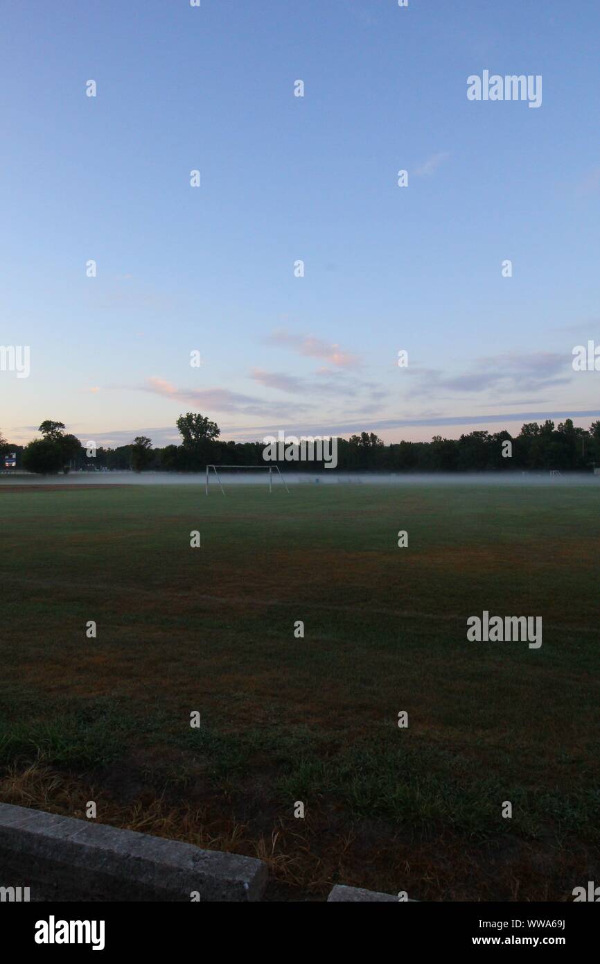 Foggy Athletic Field Stock Photo - Alamy