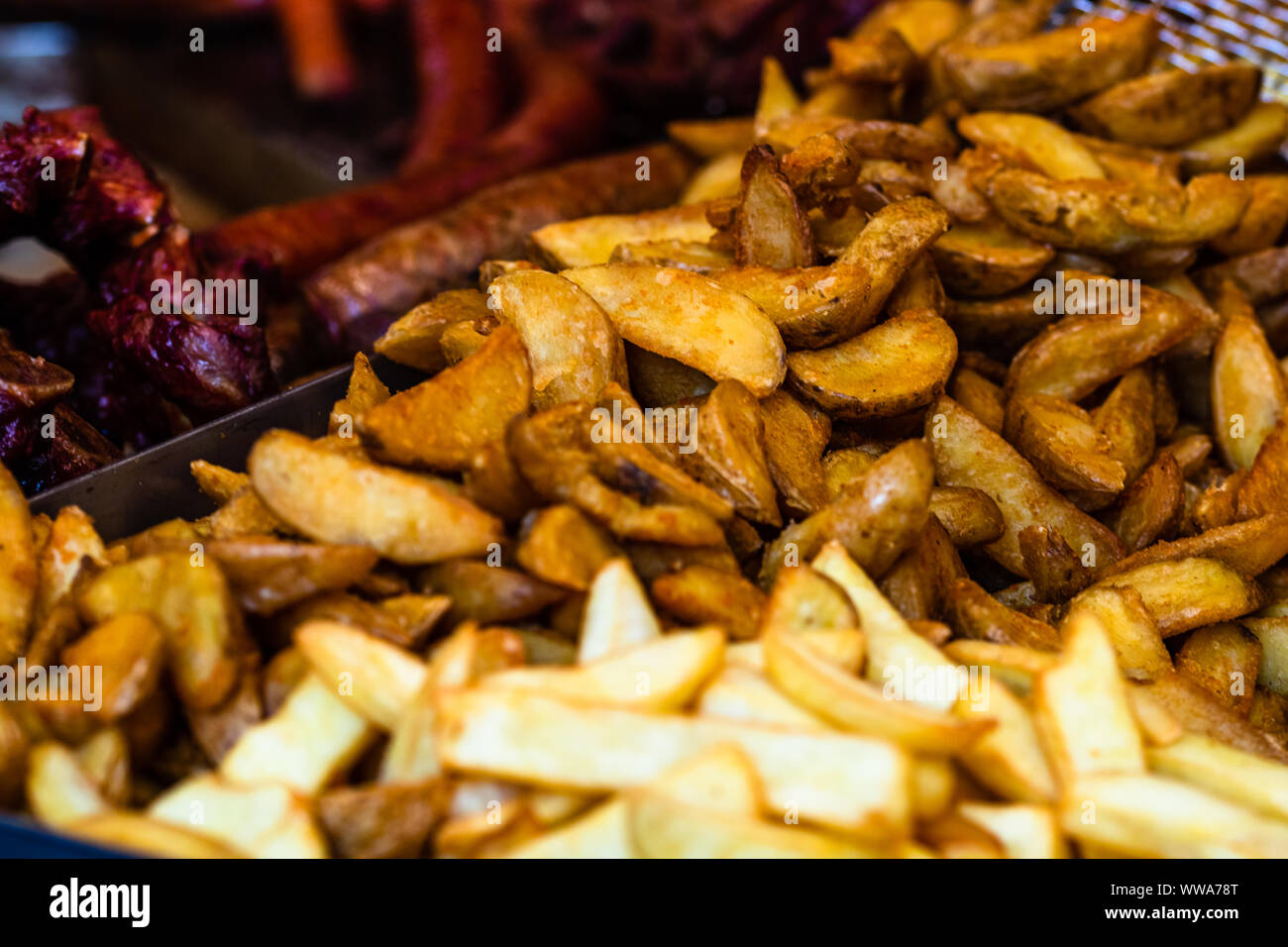 Fresh fried potatoes, french fries at a street food festival Stock ...