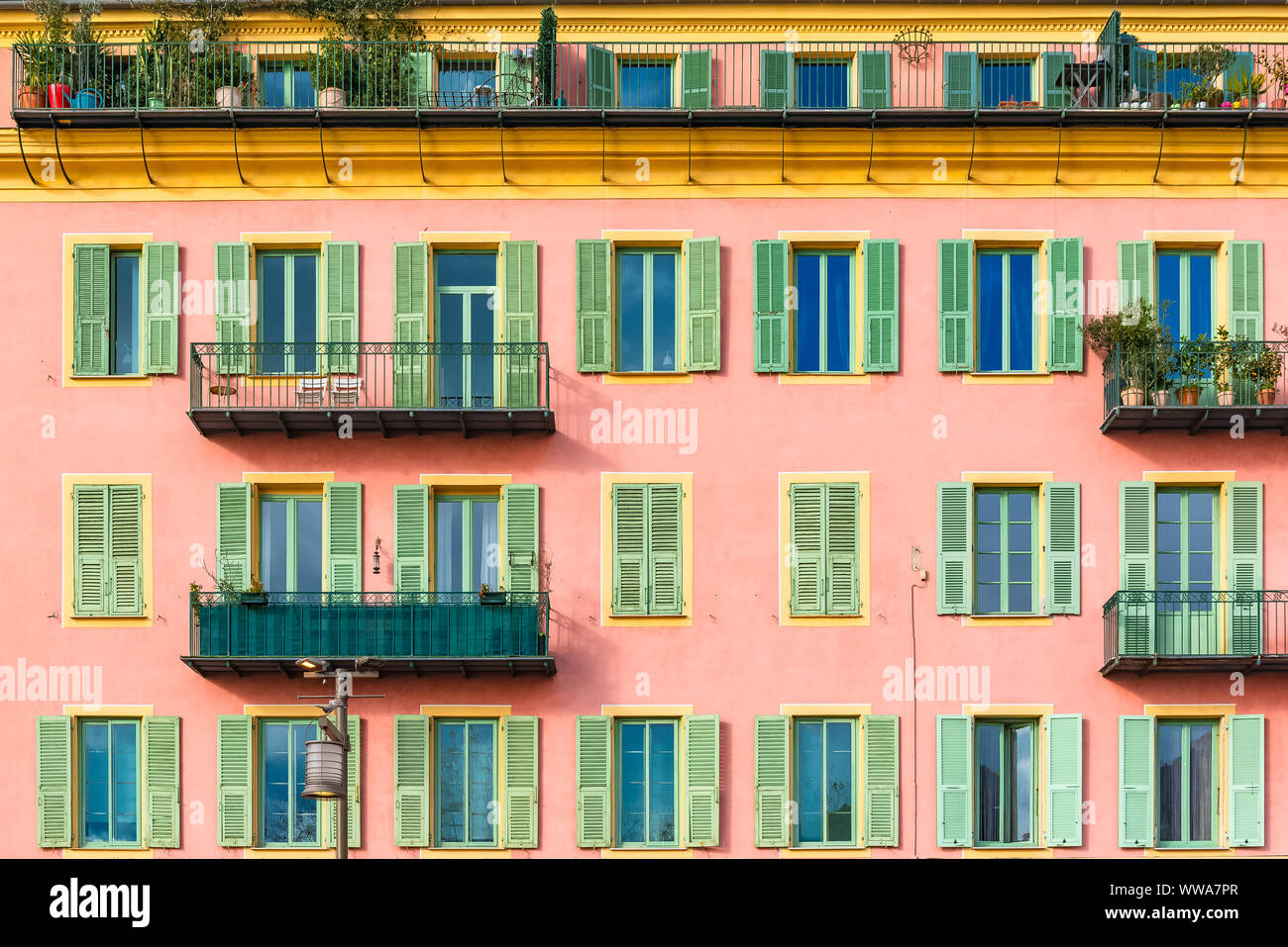 Nice, France, colorful facades, with typical windows and shutters Stock ...