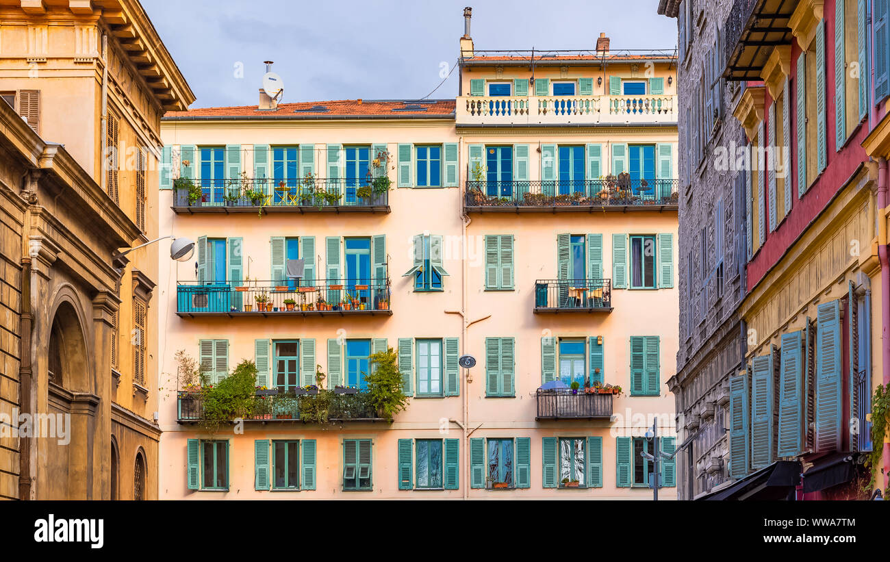 Nice, France, colorful facades, with typical windows and shutters Stock ...
