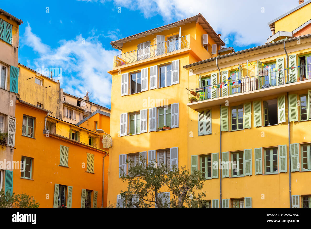 Nice, France, colorful facades, with typical windows and shutters Stock ...