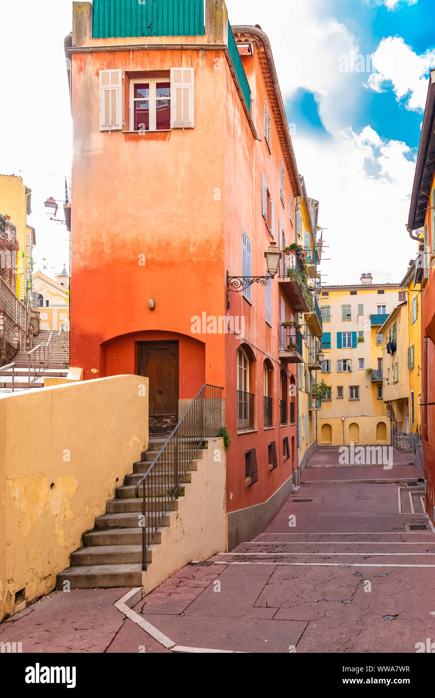Nice, France, colorful facade, with typical windows and shutters, in a ...