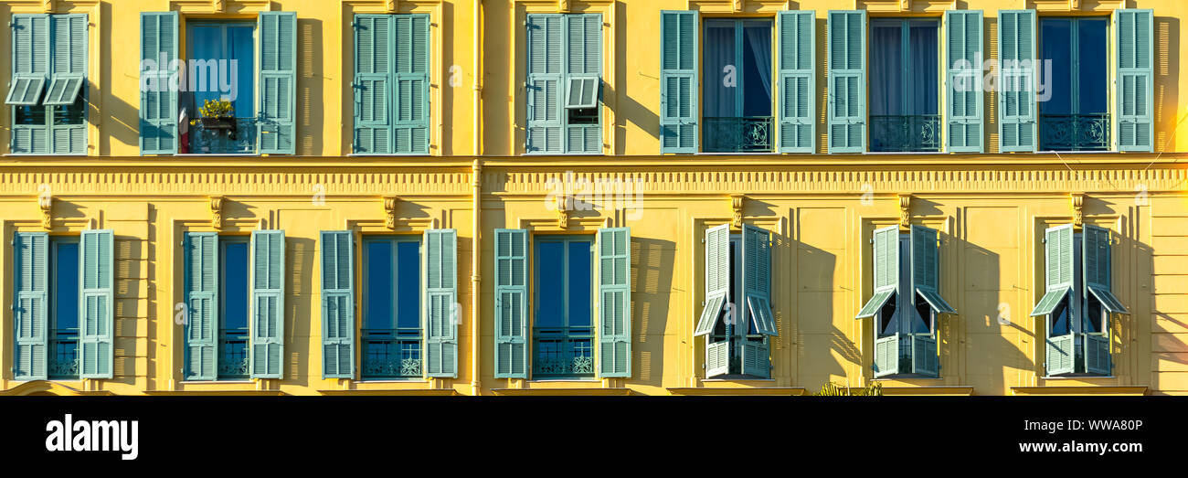 Nice, France, colorful facades, with typical windows and shutters Stock ...