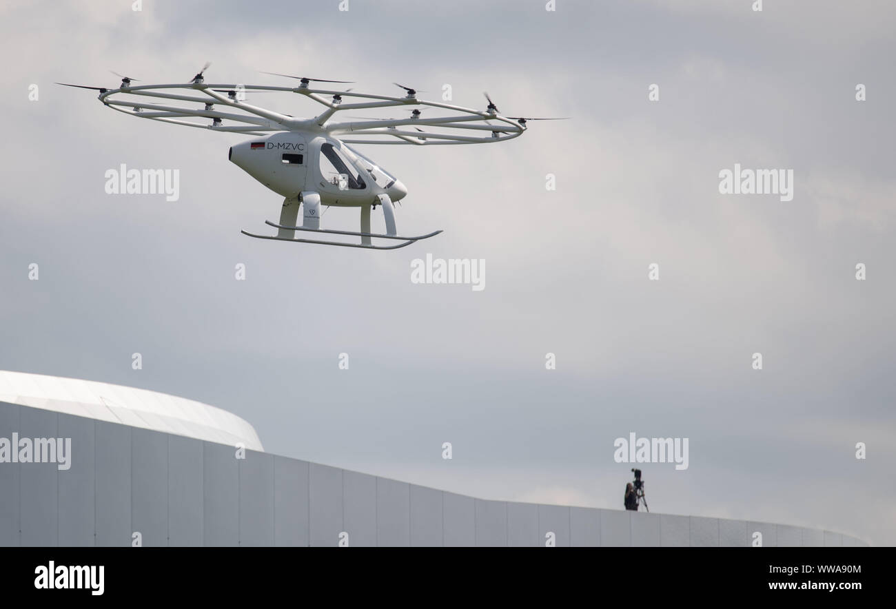 Stuttgart, Germany. 14th Sep, 2019. A so-called Volocopter flies over ...