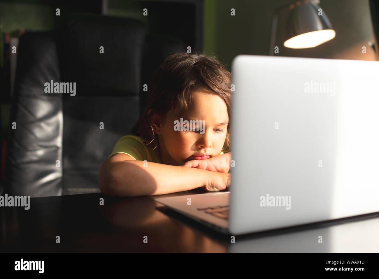Cute baby girl working on a computer at home Stock Photo - Alamy