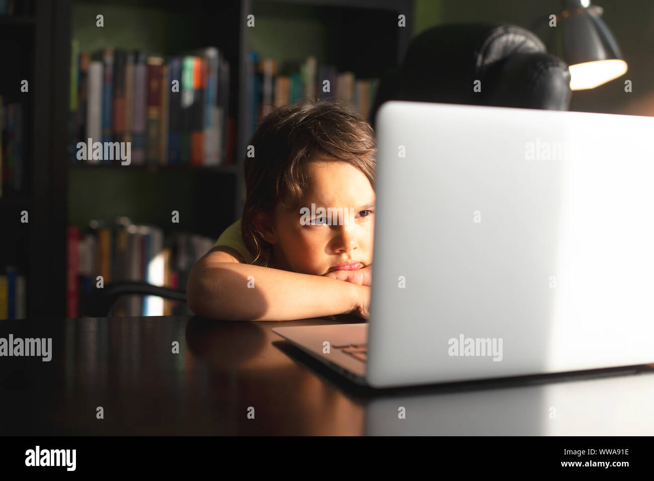 Cute baby girl working on a computer at home Stock Photo - Alamy