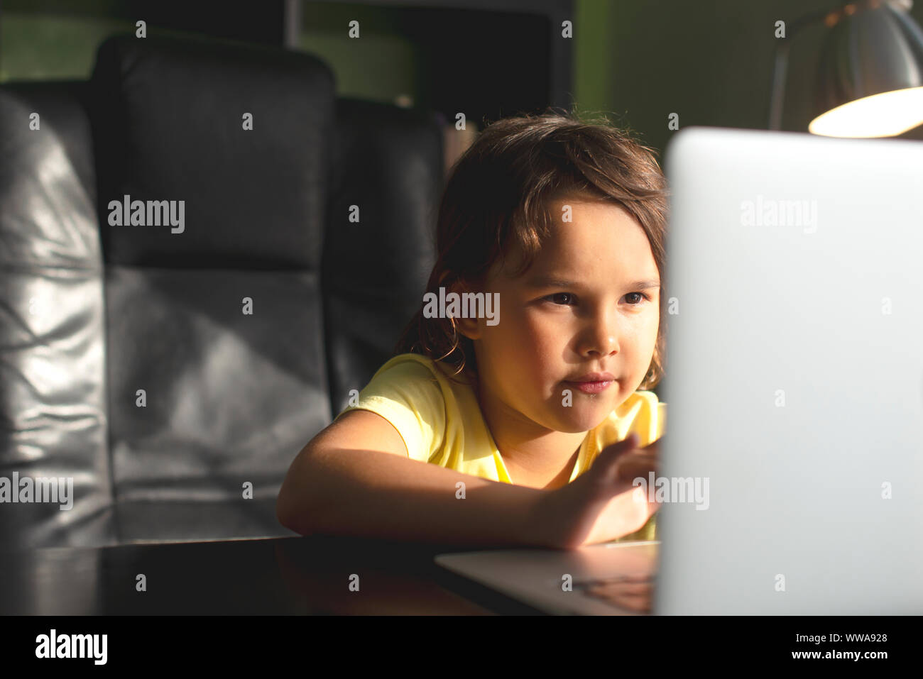 Cute baby girl working on a computer at home Stock Photo - Alamy